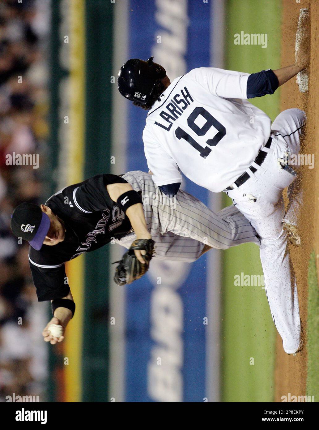 Detroit Tigers' Jeff Larish (19) breaks up a double play by sliding ...