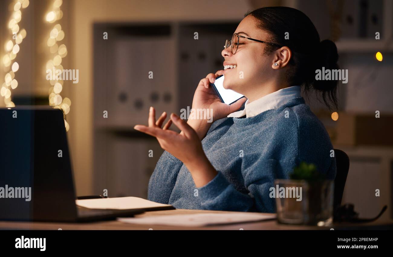 Business woman, phone call and talking in office at night, chatting or speaking to contact ...