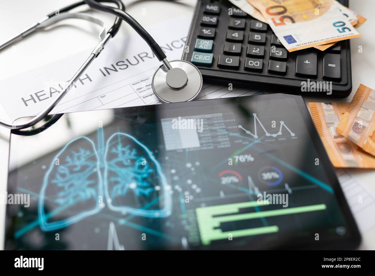 Modern social health insurance program. Tablet computer with healthcare ...