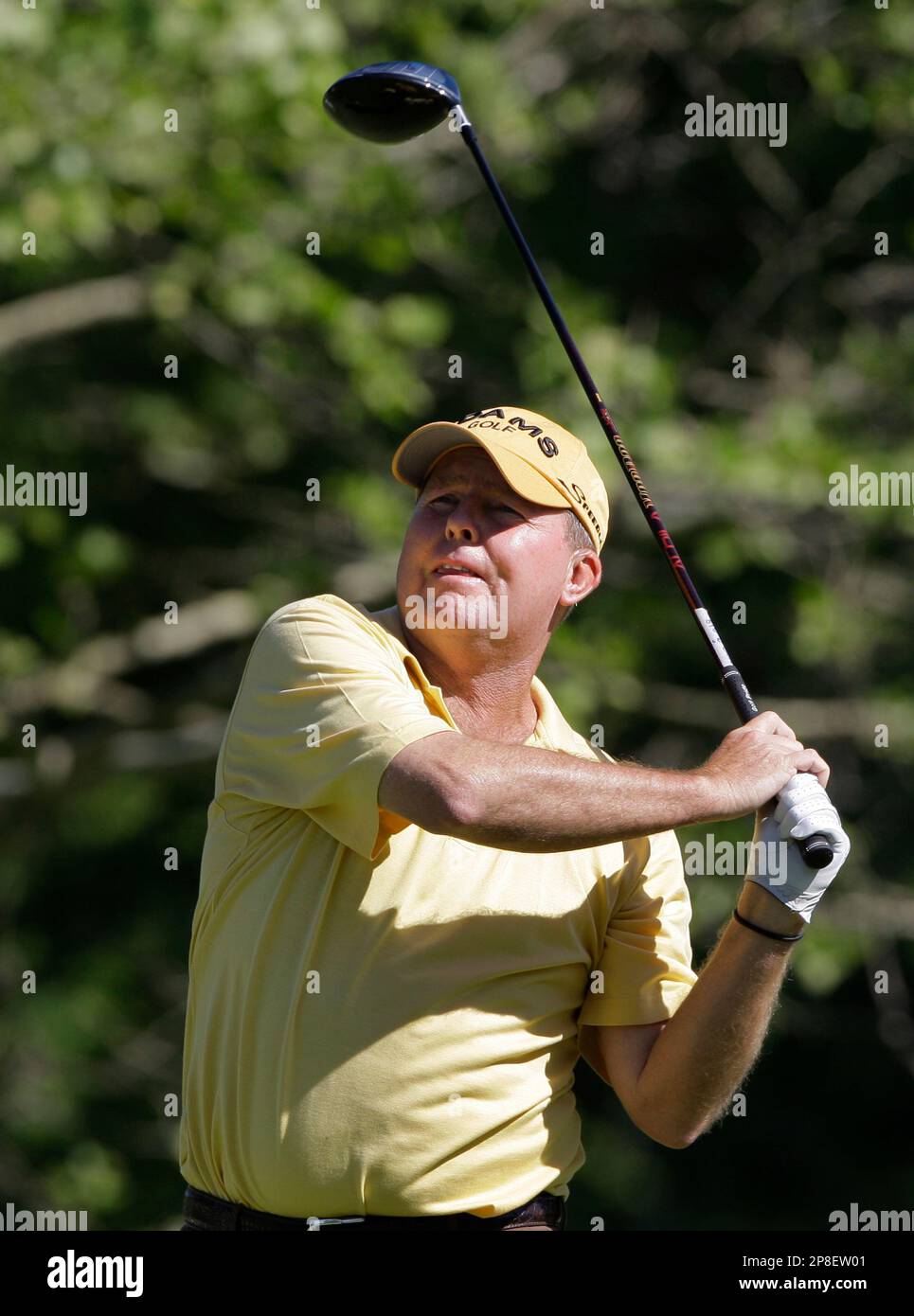 Scott Hoch watches his tee shot from the eighth tee during the first ...
