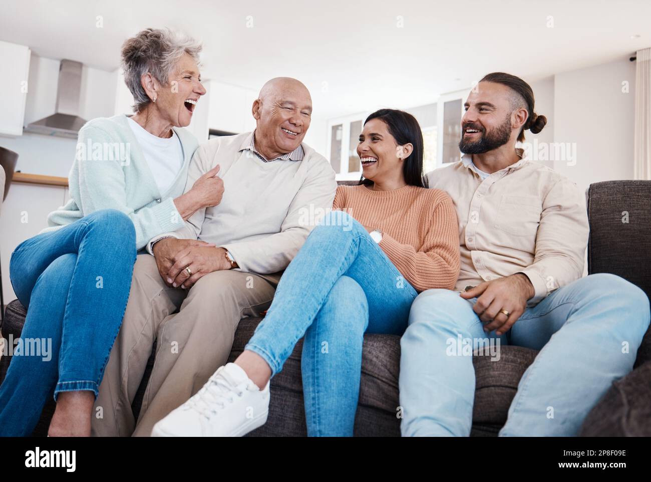 Parents, couple and happy family bonding in a home or house together ...