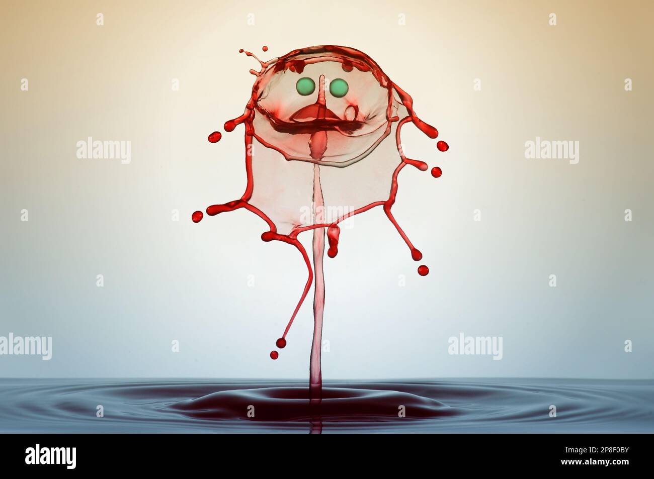 Close-up of a water droplet and splash crown with a smiley face Stock ...