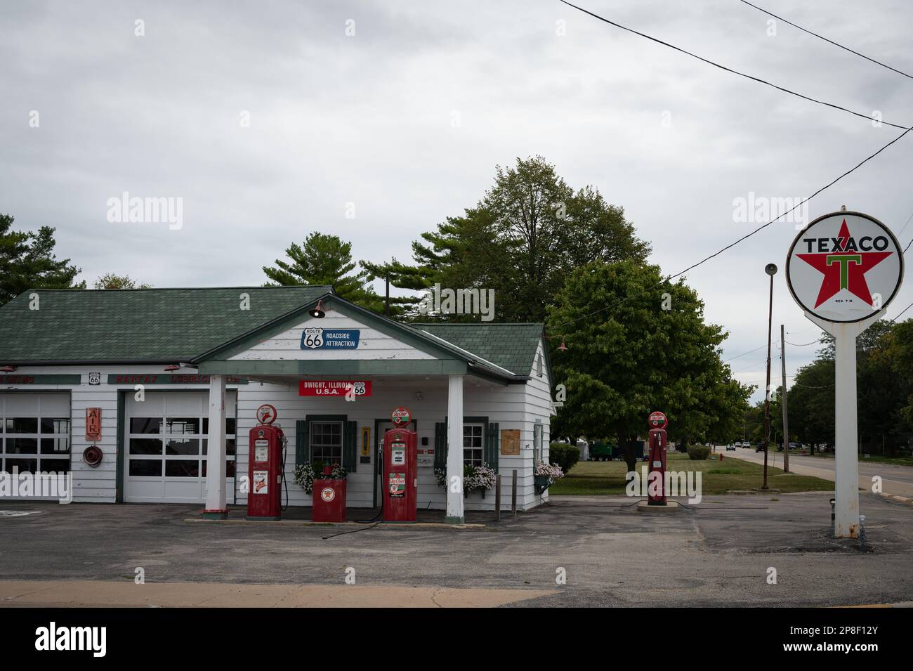 A Texaco gas station in a rural setting on an empty road in Dwight ...