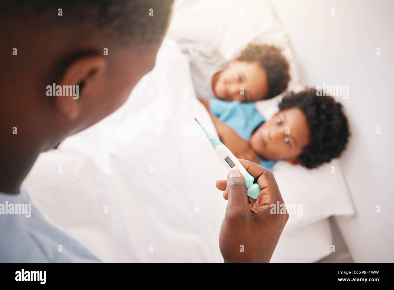 Black family, father and sick kids with thermometer for checking temperature, fever or illness ...