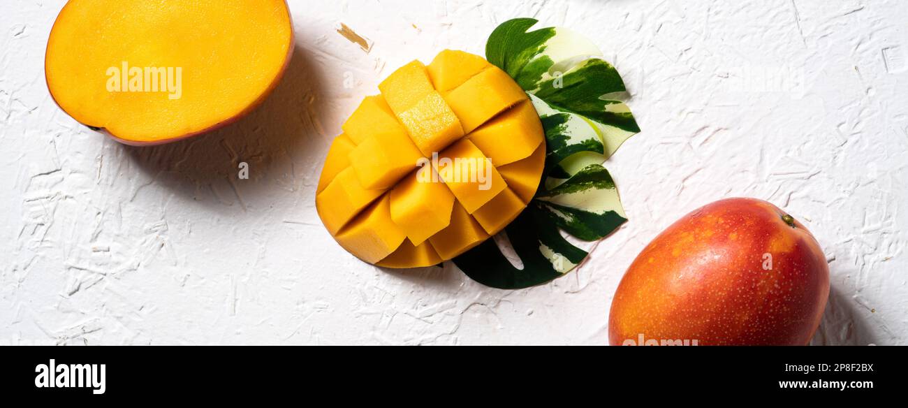 Mango background design concept. Top view of diced fresh mango fruit ...