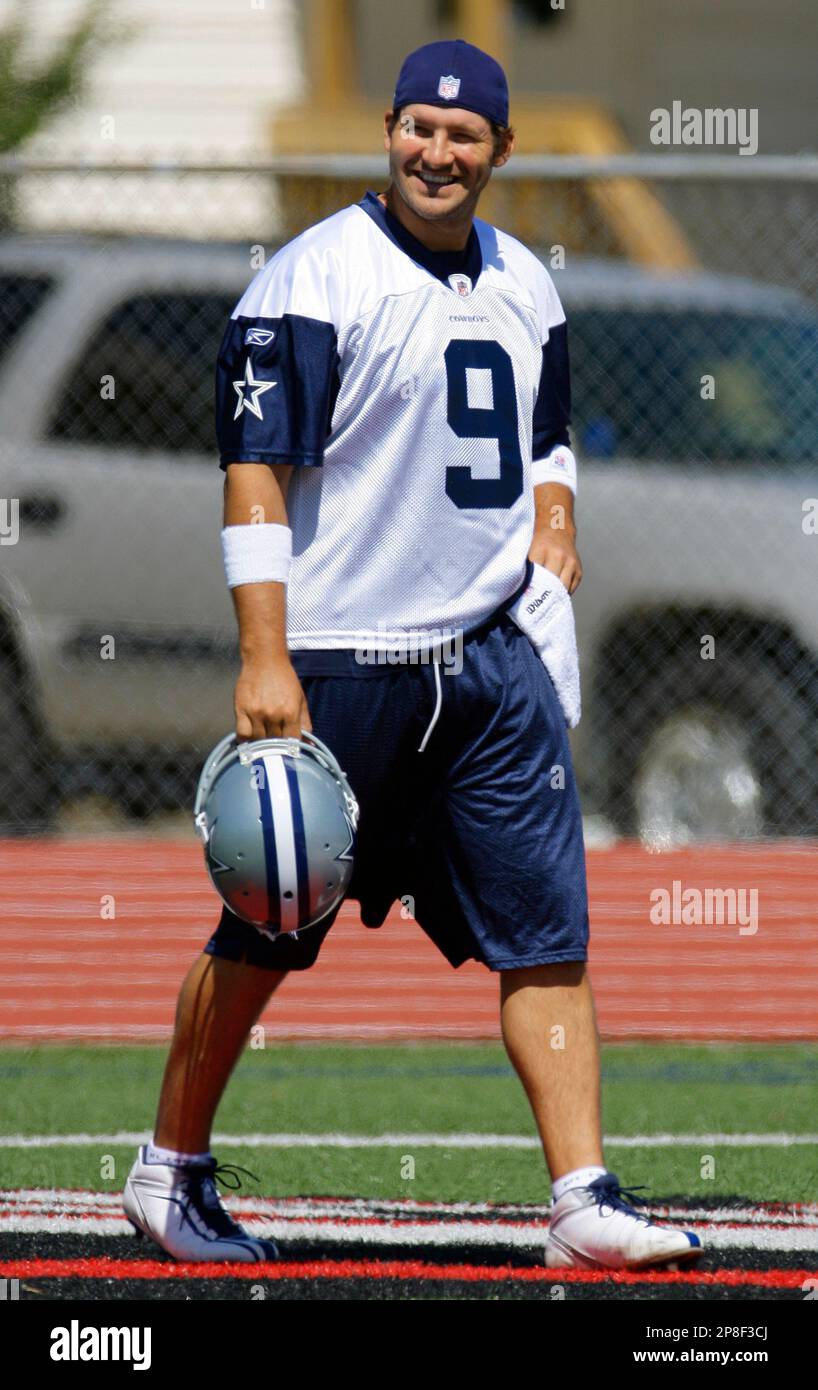 Dallas Cowboys quarterback Tony Romo (9) walks onto the field at the ...