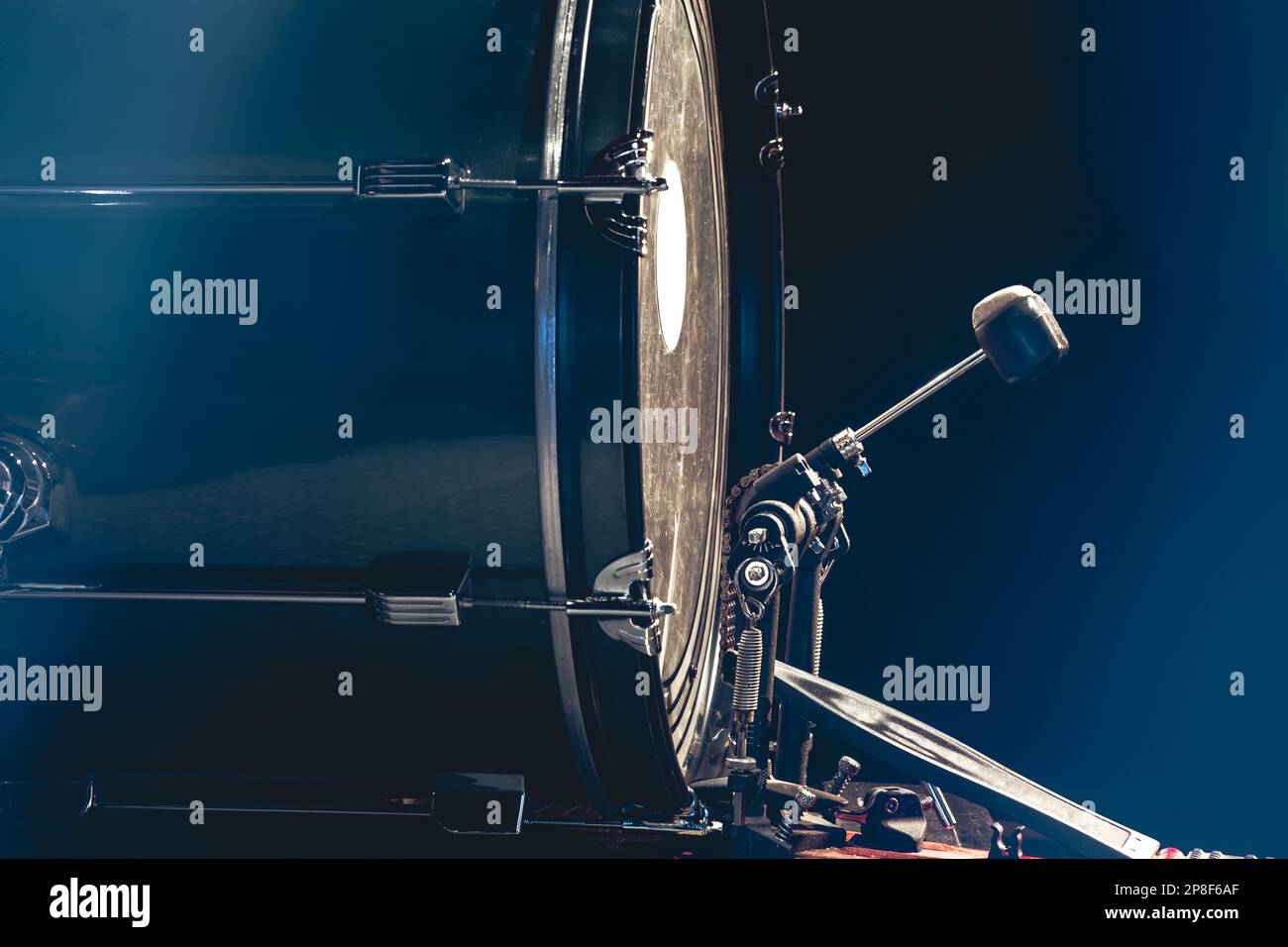 Bass drum with pedal, musical instrument on black background Stock ...