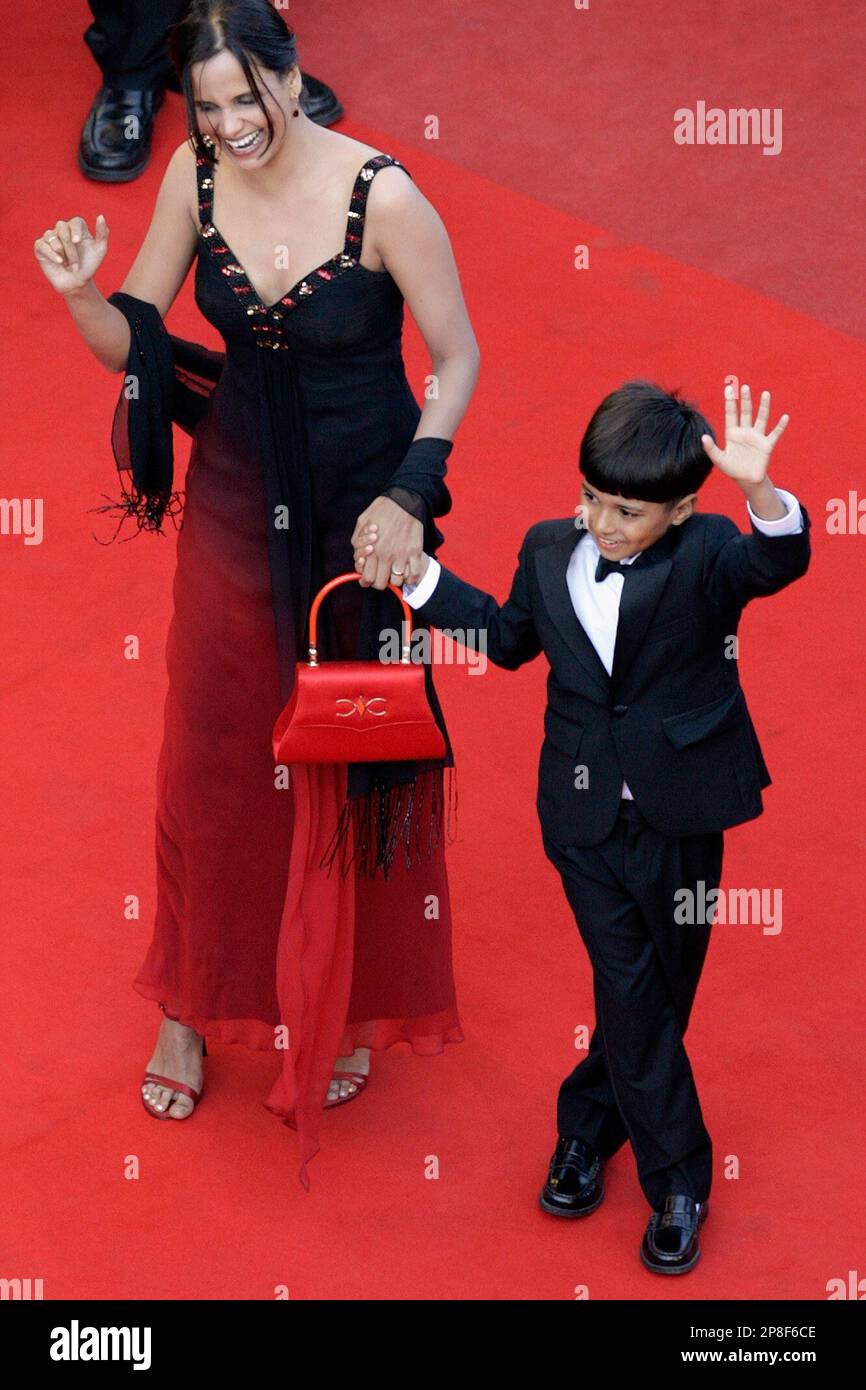 Indian child actor Azharuddin Mohammed Ismail, right, who starred in ...