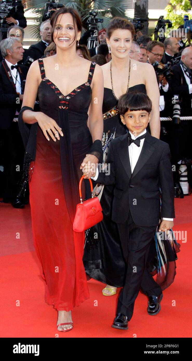 Indian child actor Azharuddin Ismail, foreground right, arrives on the ...
