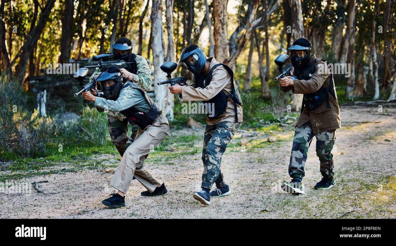 Army, military and people with guns for paintball, shooting game and ...