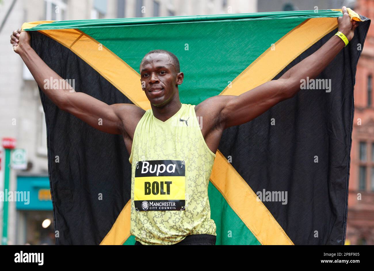 Jamaican athlete Usain Bolt poses for pictures after winning a 150m ...