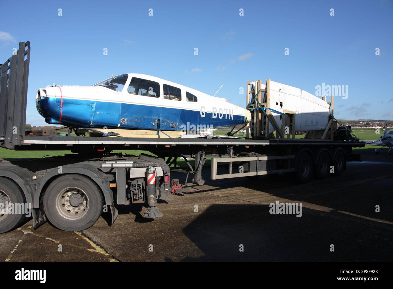 A Piper PA-28 Cherokee leaving Brighton City Airport Sussex on a flat ...