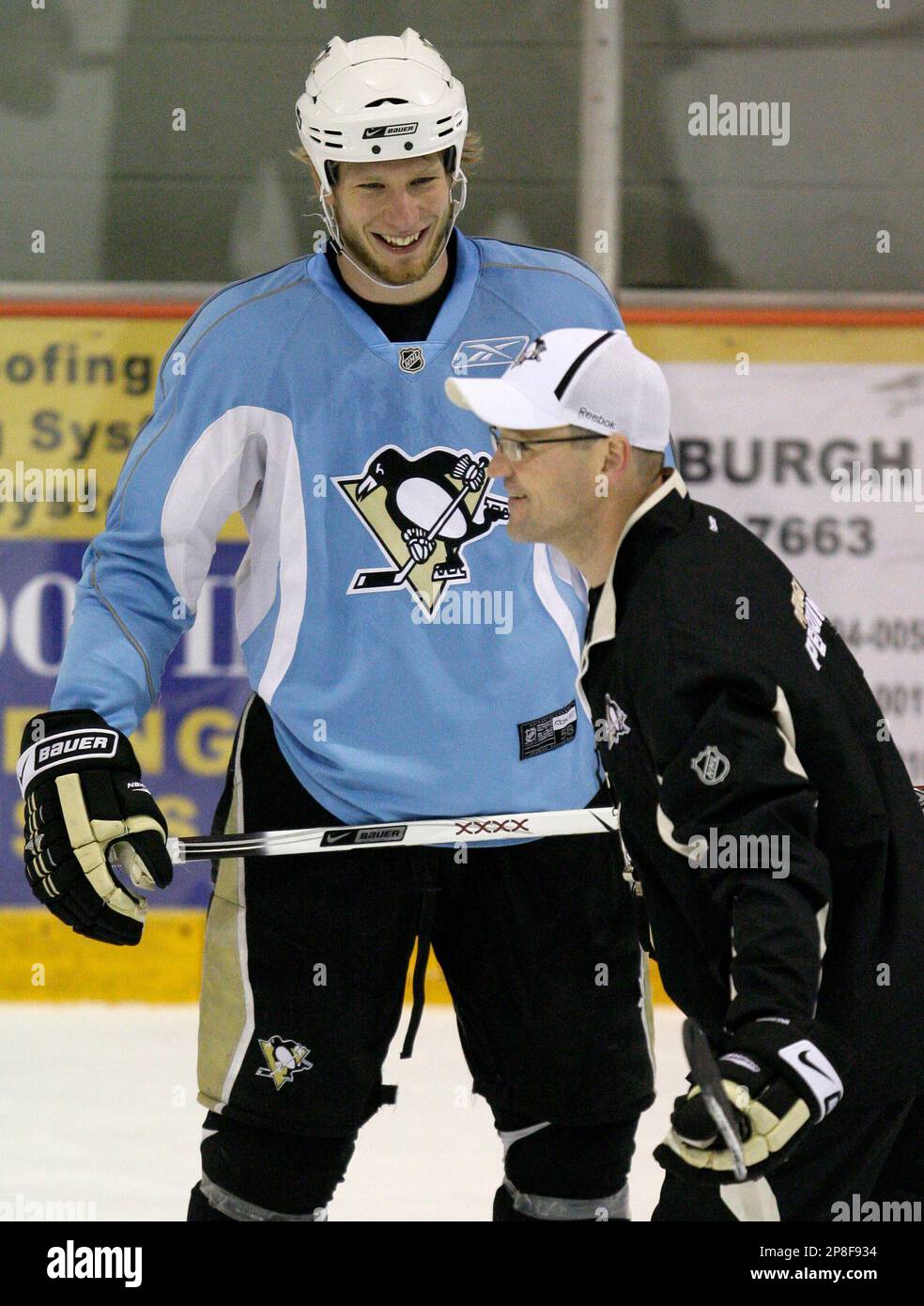 Pittsburgh Penguins' Jordan Staal, left, and coach Dan Bylsma attend ...