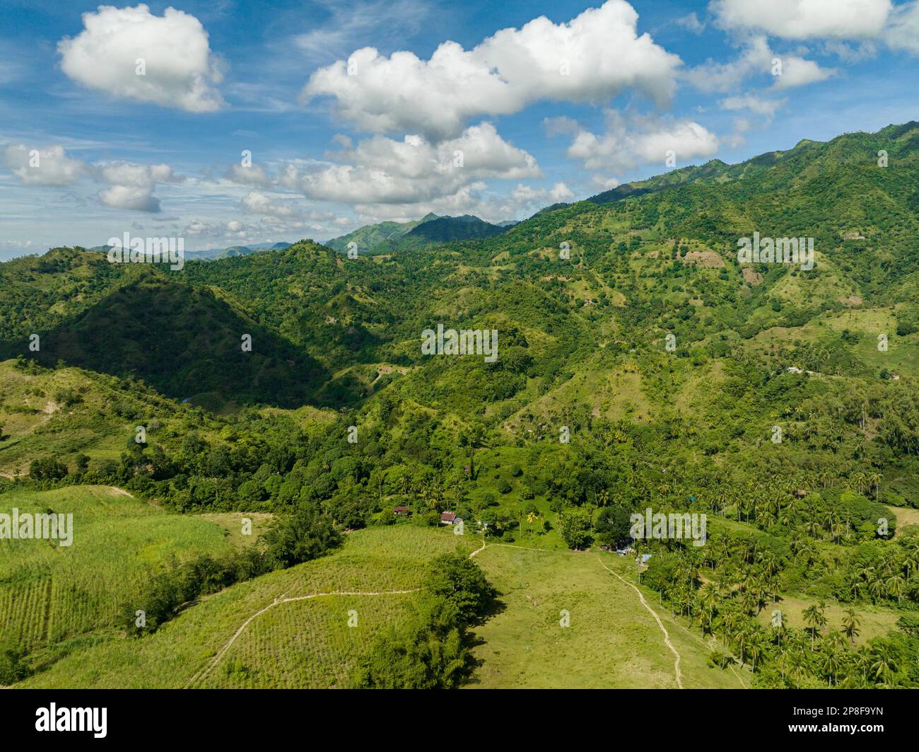 Farmland on the slopes of hills in the mountainous region view from ...