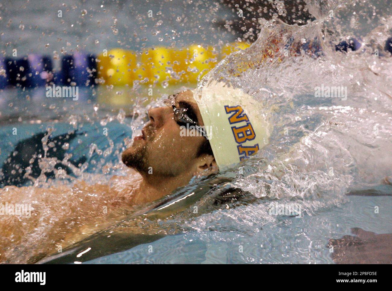 Olympic swimming gold medalist Michael Phelps swims in the men's ...