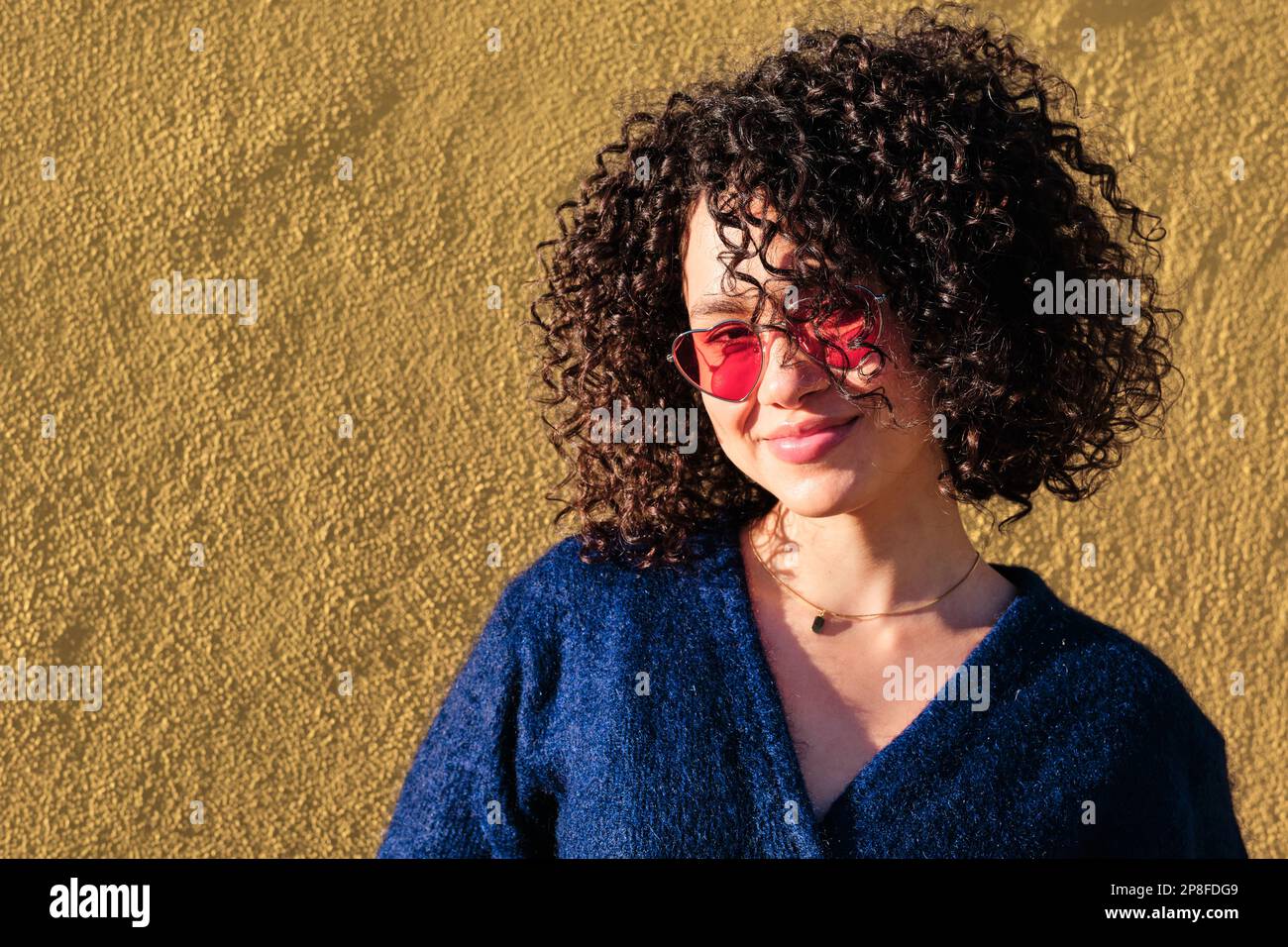 Cute smiley woman with curly hair and heart shape sunglasses Stock ...