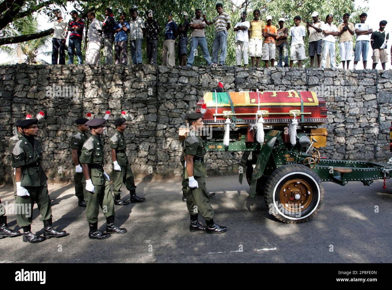 Sri Lankan army soldiers march during the funeral of Lance Corporal ...