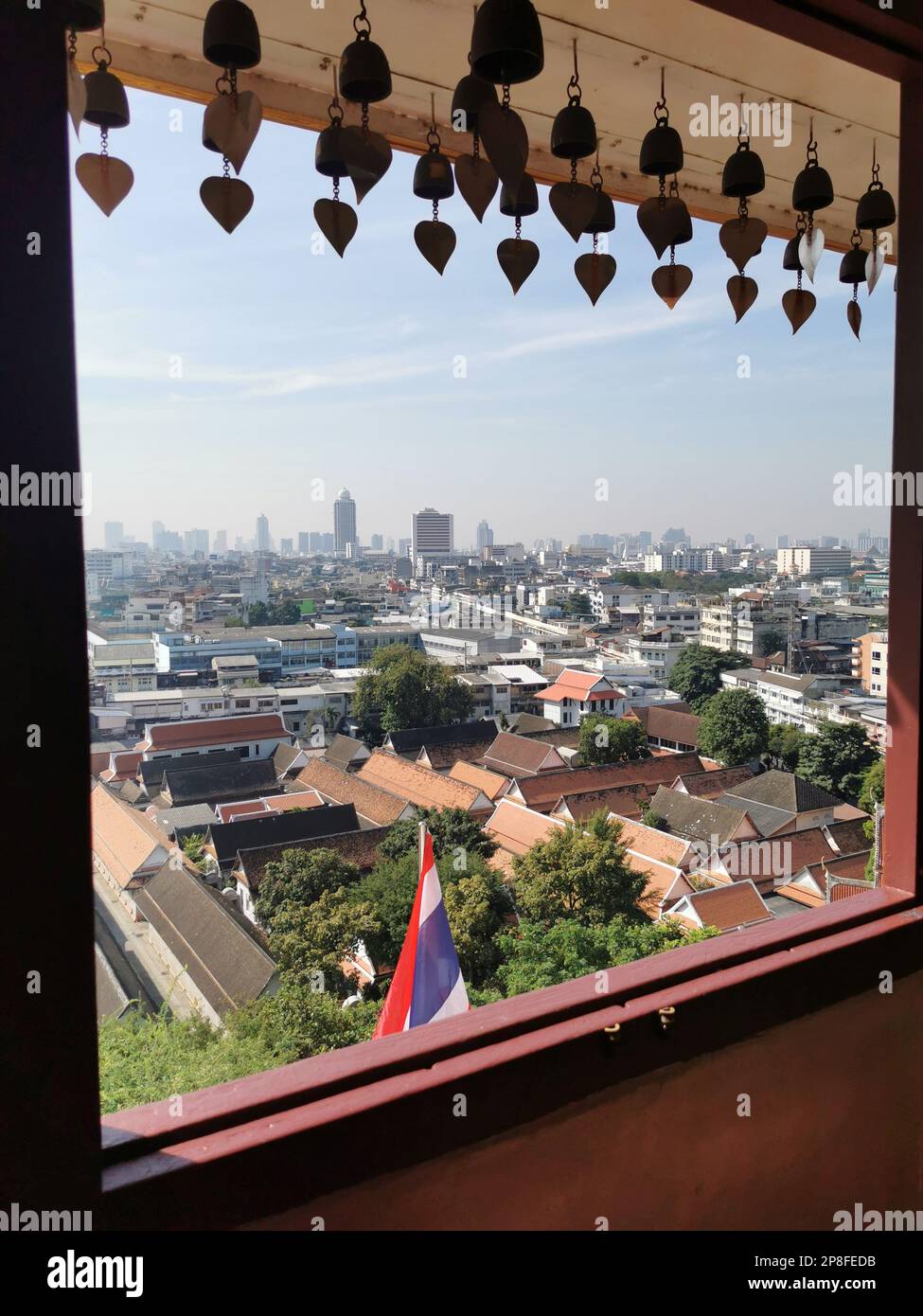 View of Bangkok through temple window Stock Photo - Alamy