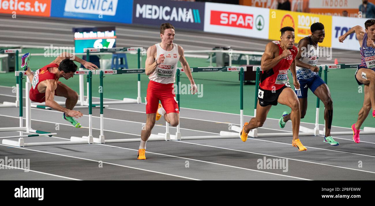 Enrique Llopis of Spain hits the last hurdle and falls while competing ...