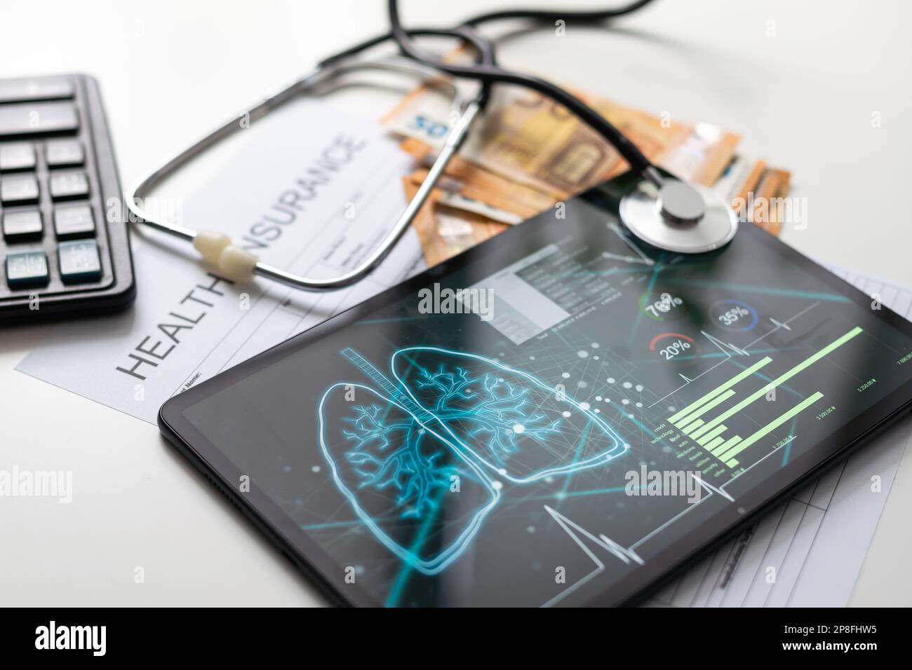 Modern social health insurance program. Tablet computer with healthcare ...