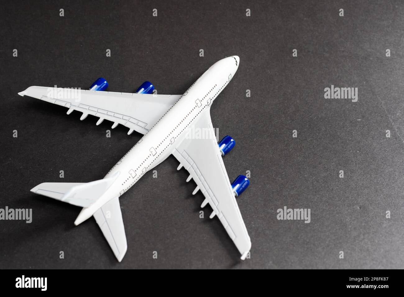 Model plane, airplane on dark background Stock Photo - Alamy