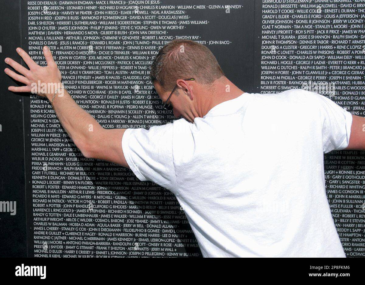 Volunteer Harvey Britton of Sheridan, Wyo. supports a section of the ...