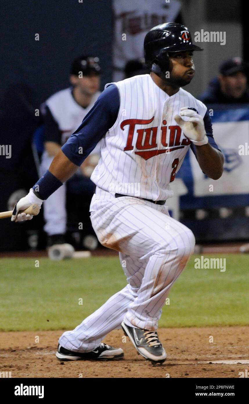 Minnesota Twins' Denard Span watches his two-run triple off Detroit ...