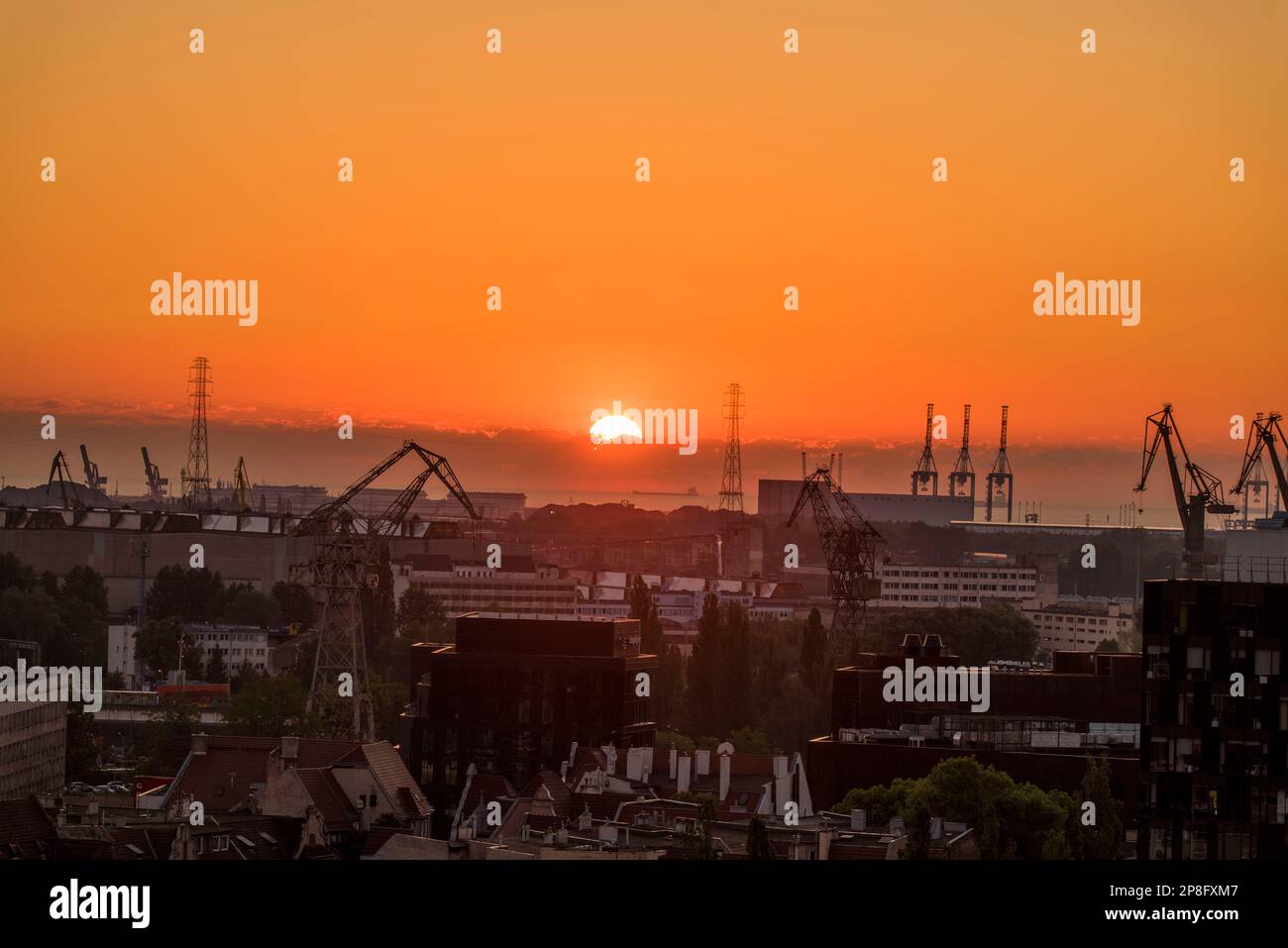 sunset in the port Stock Photo - Alamy