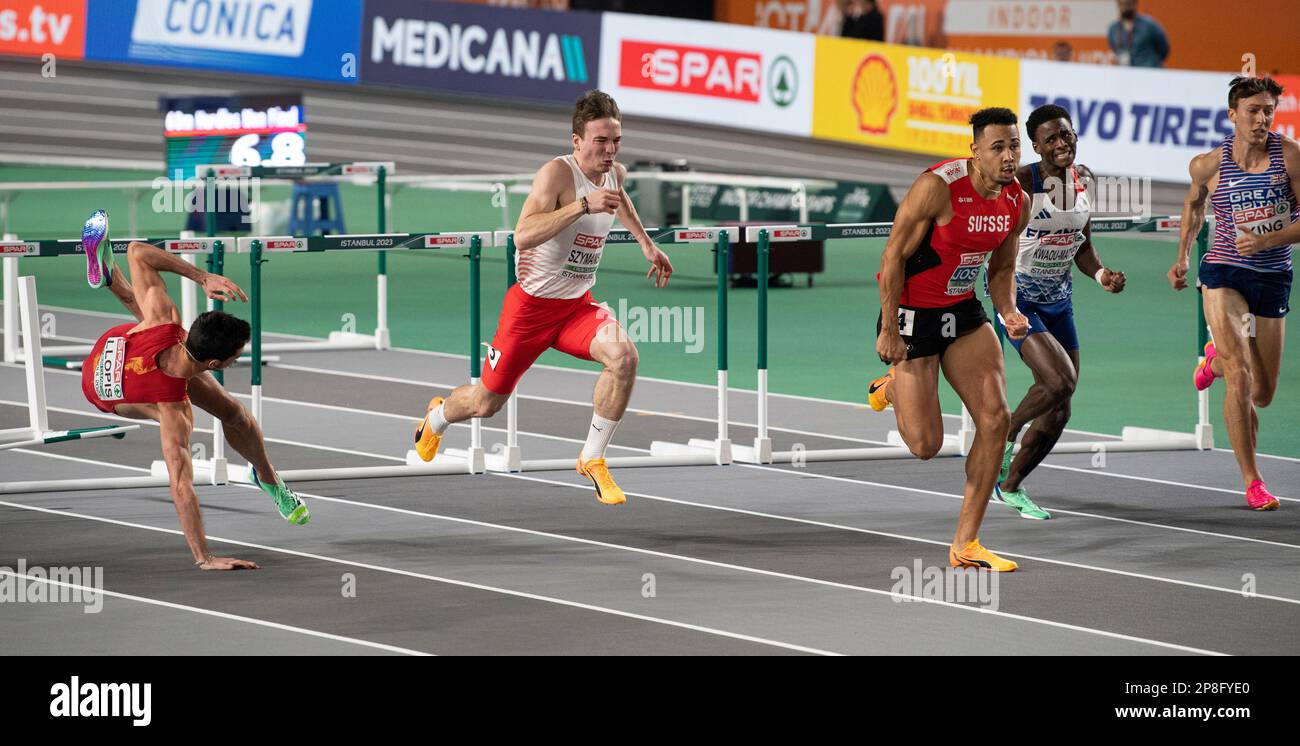 Enrique Llopis of Spain hits the last hurdle and falls while competing ...