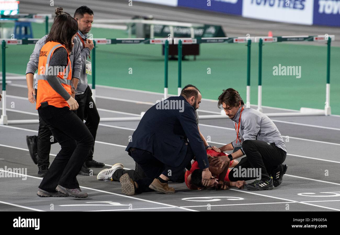 Medical staff rush to the aid of Enrique Llopis of Spain as he lays ...