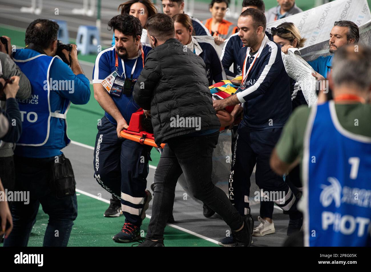 Medical staff rush to the aid of Enrique Llopis of Spain as he lays ...