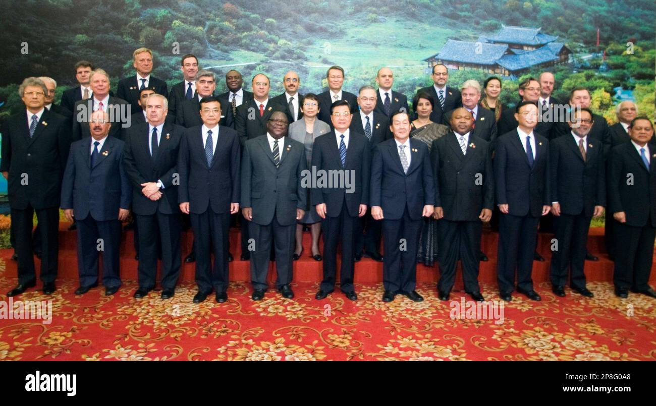 Foreign and Chinese dignitaries, including Hu Jintao, China's president, front row, sixth from ...