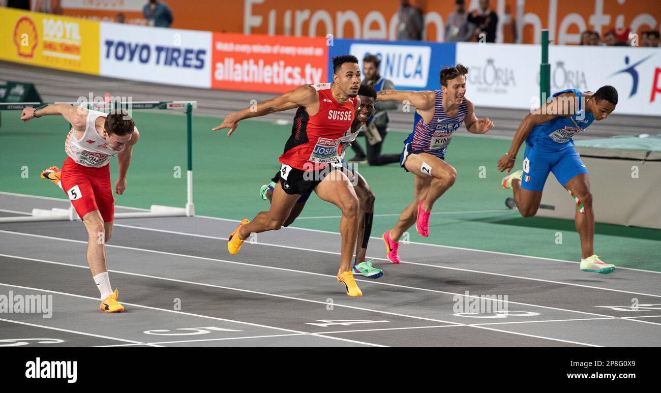 Jason Joseph of Switzerland on his way to winning the men’s 60m hurdles ...