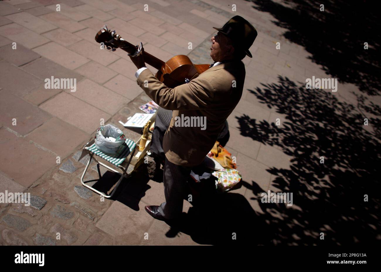 A man dressed as Carlos Gardel performs in Buenos Aires, Saturday, Feb ...