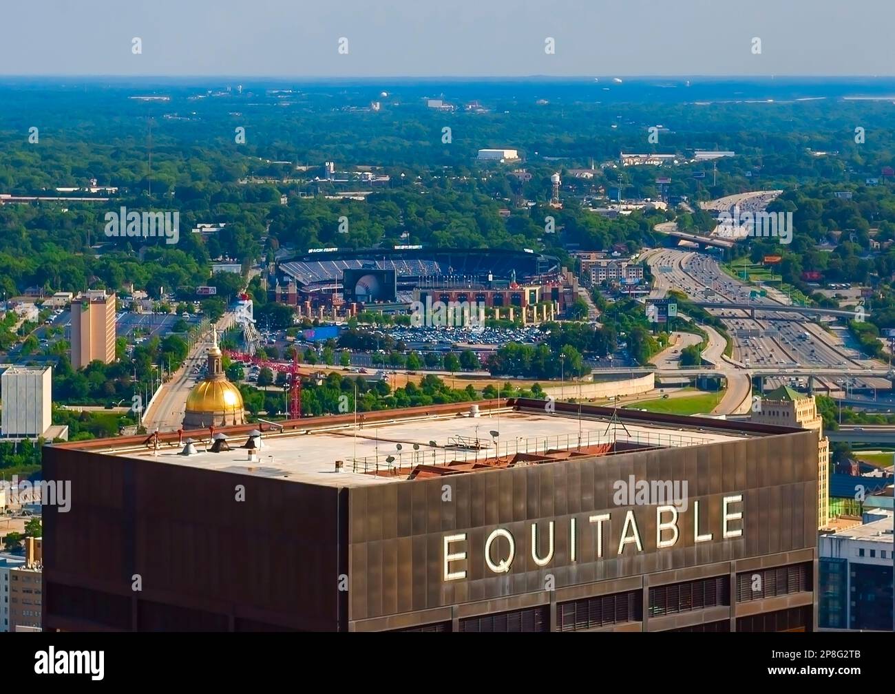 A close up of the Equitable building with I-85 and Georgia State Center ...