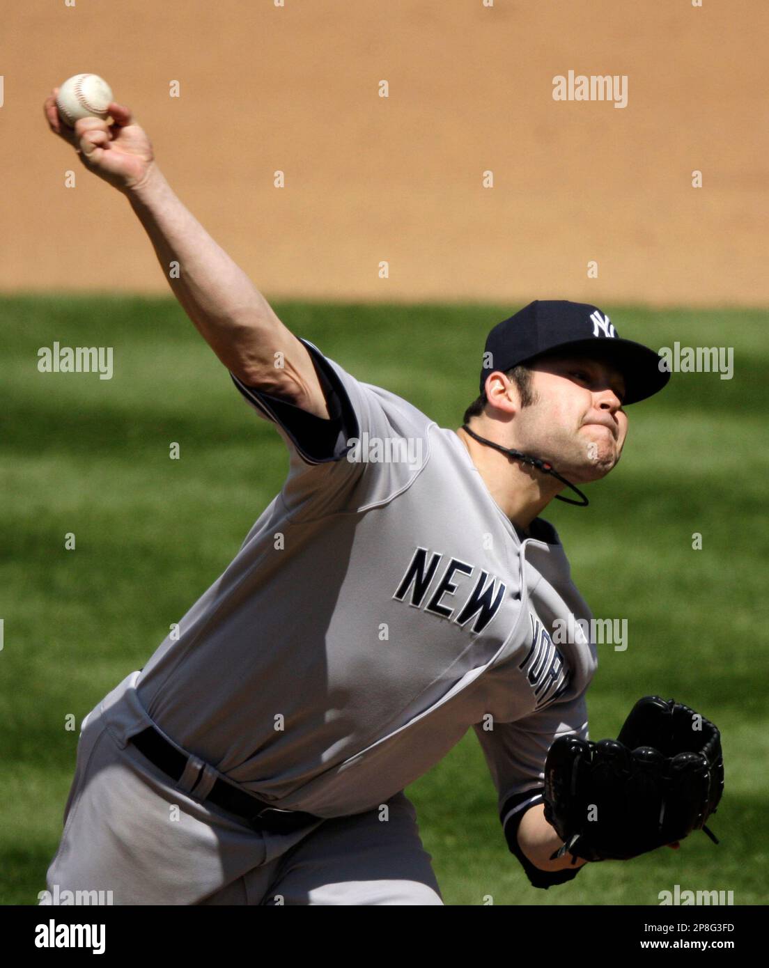 New York Yankees starting pitcher Joba Chamberlain works against the ...