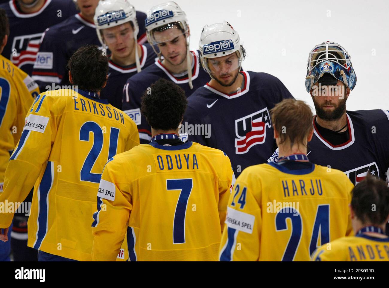 United States goalie Robert Esche, right, congratulates with other ...