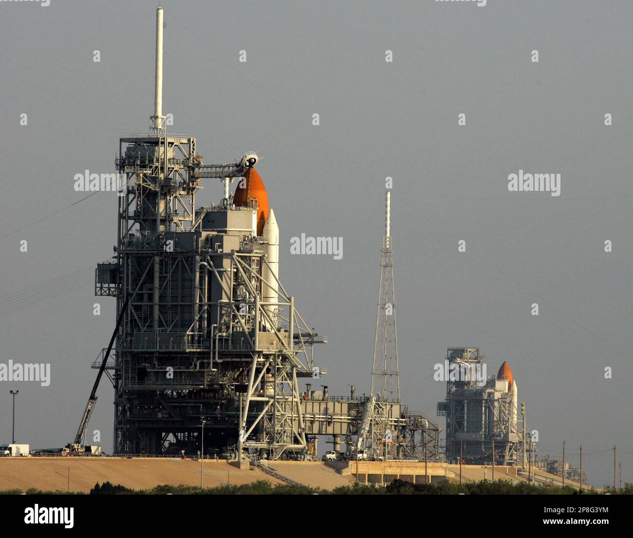 Space shuttles Atlantis, left, and Endeavour are shown on their launch ...