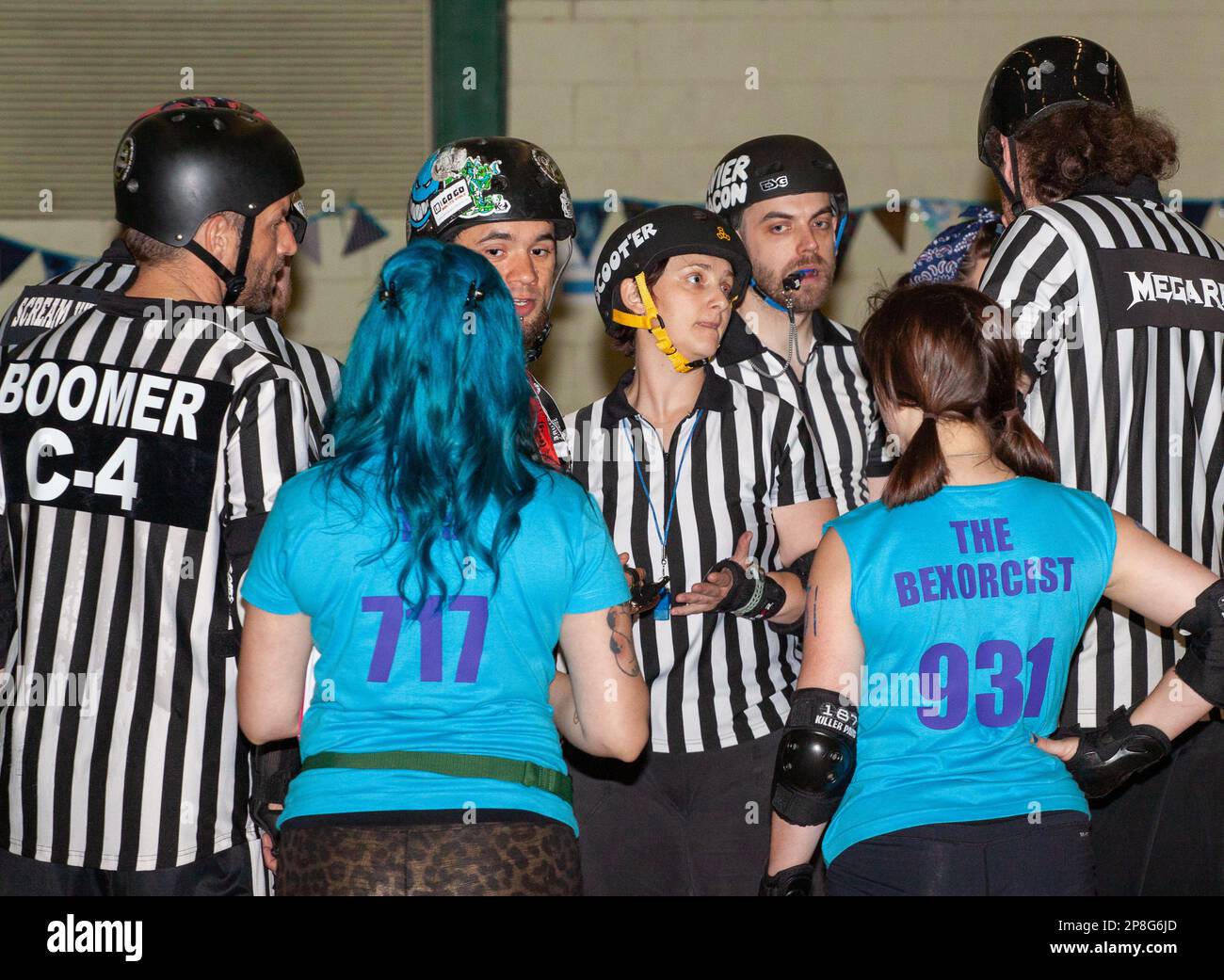 Official time out at a roller derby for the referees to discuss what ...