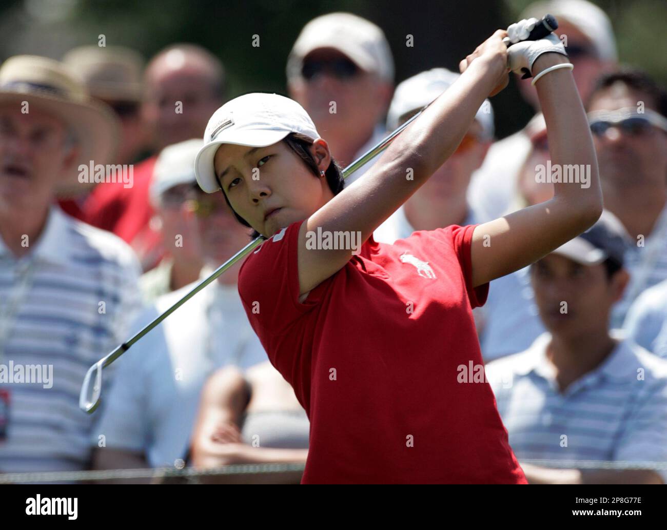 Song-Hee Kim, of South Korea, looks at her tee shot on the second hole ...