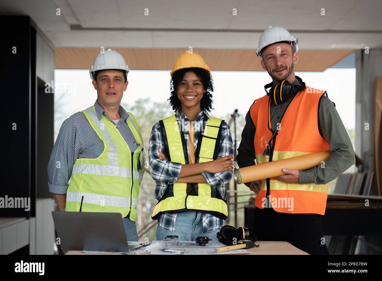 Team engineer with construction and project blueprint. building plans ...