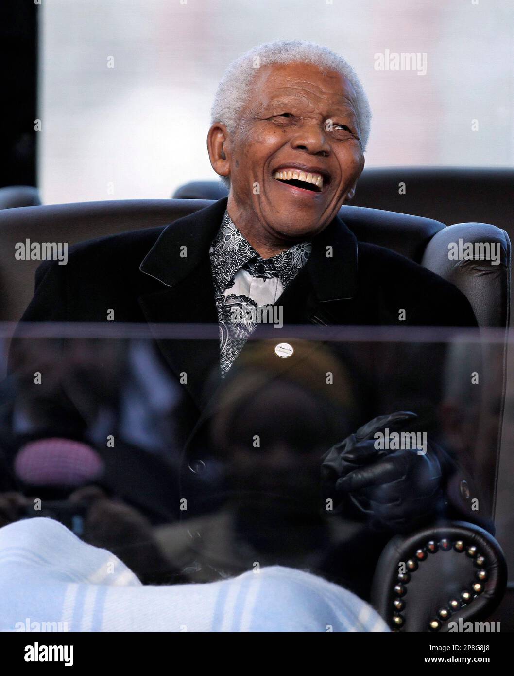 South Africa's former President Nelson Mandela reacts as newly ...
