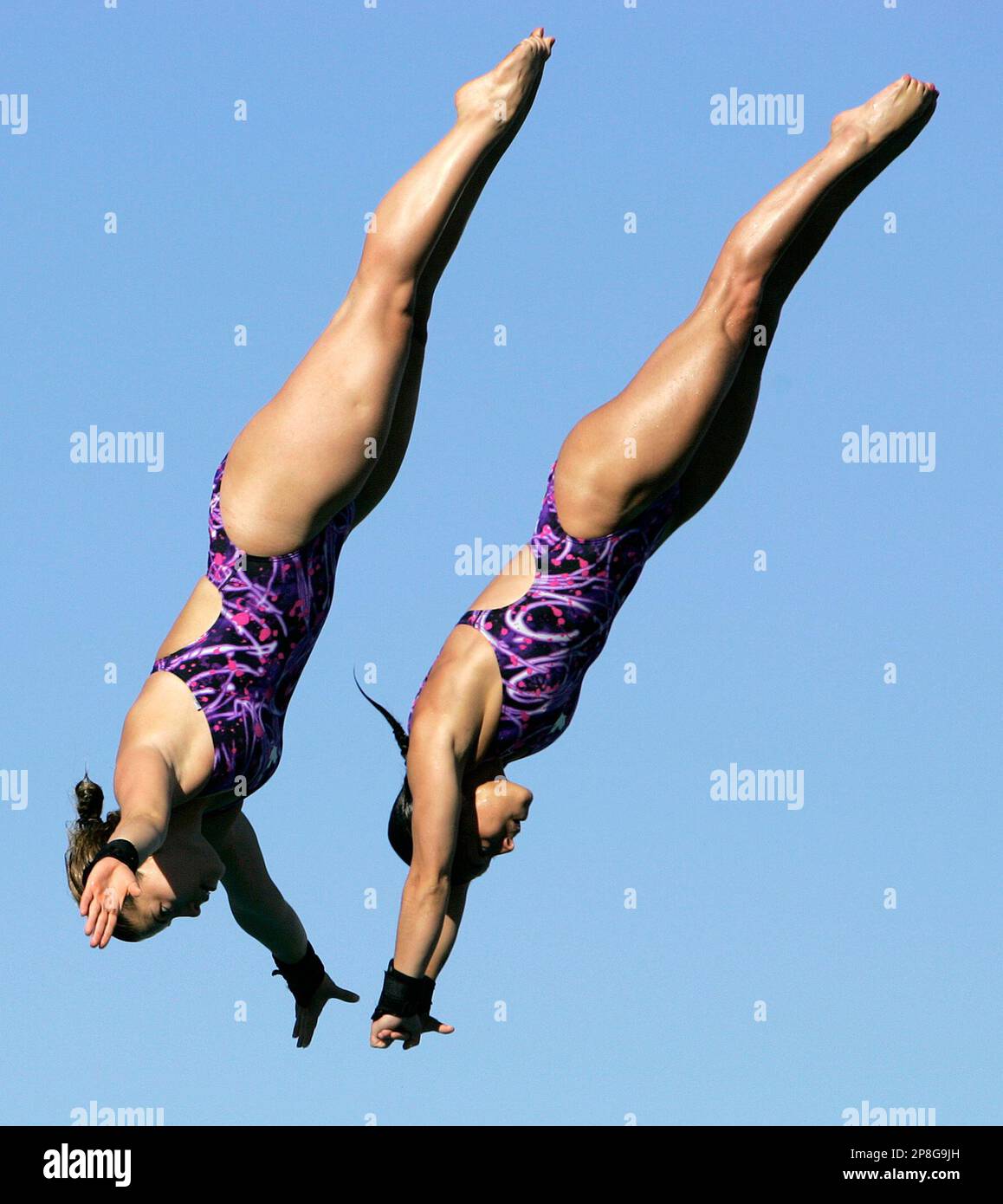 Canada's Roseline Filion, left, and Meaghan Benfeito dive during the ...