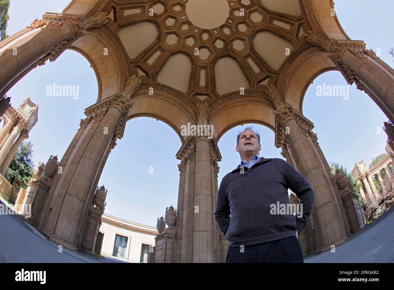 Architect Hans Baldauf, center, of San Francisco, stands beneath the restored rotunda of the ...