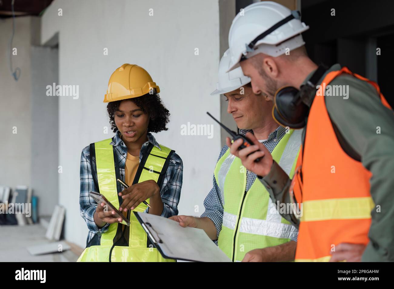 engineer in working site with blueprints, inspection in workplace for ...