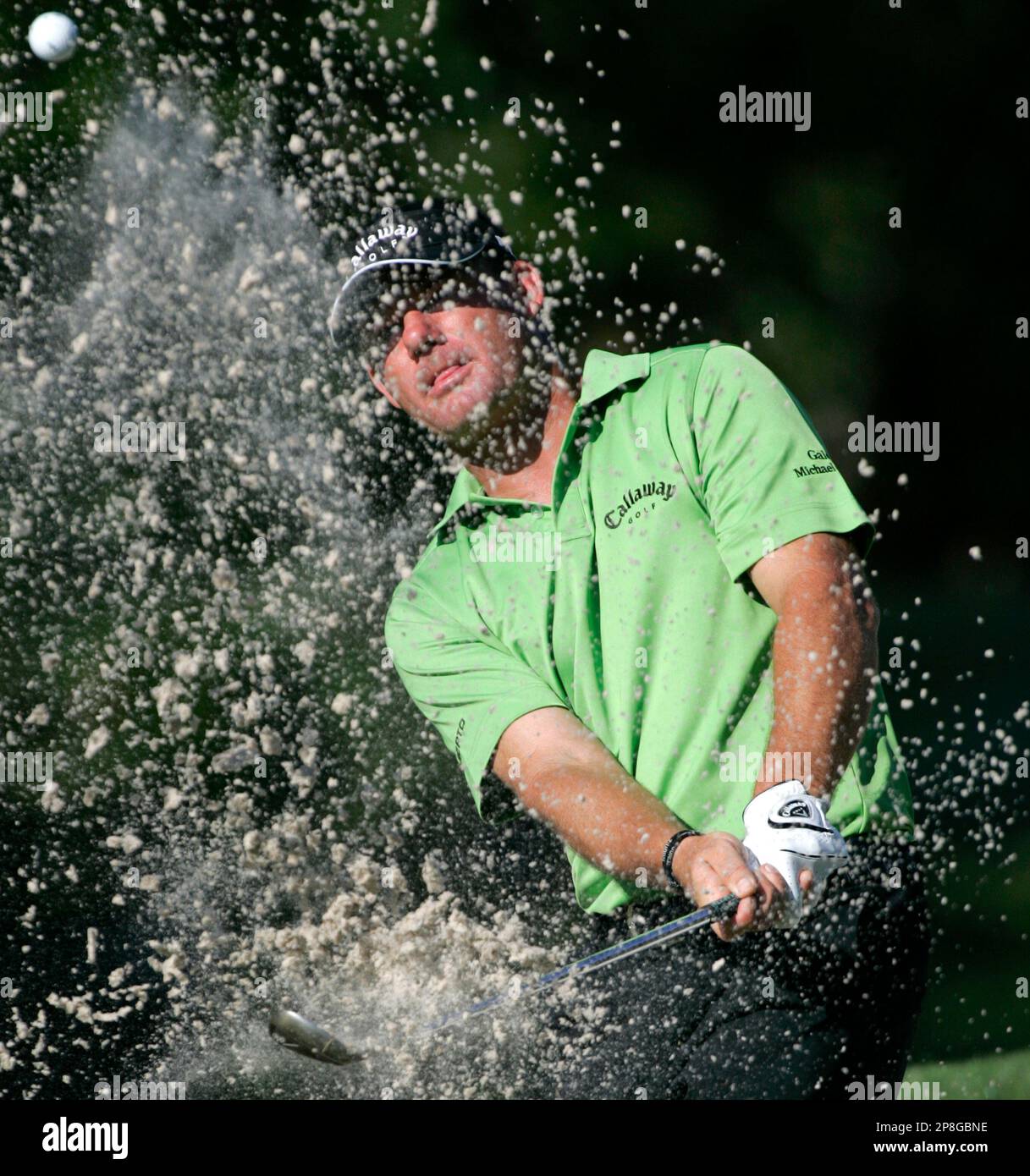 Alex Cejka blasts from the bunker on the 8th hole during the second ...