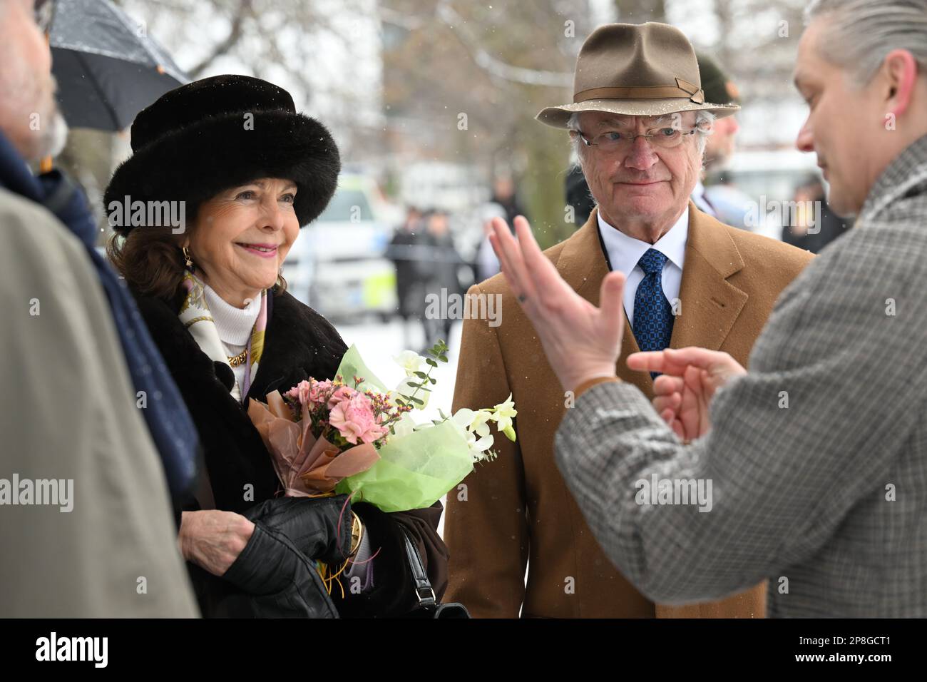 Sweden's King Carl XVI Gustaf and Queen Silvia walk from the concert ...