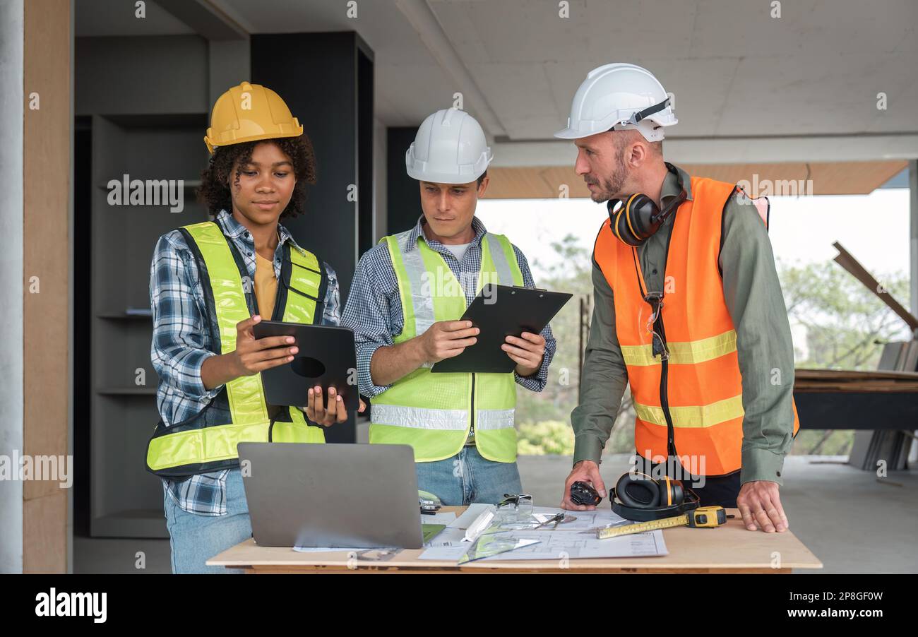 engineer in working site with blueprints, inspection in workplace for ...