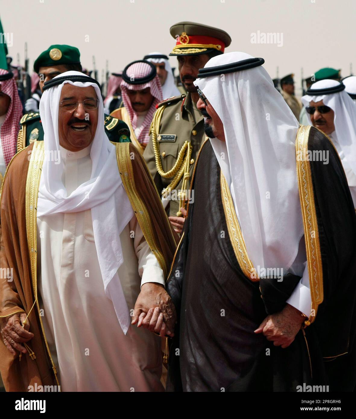 King Abdullah bin Abdul Aziz al-Saud of Saudi Arabia, right, welcomes ...