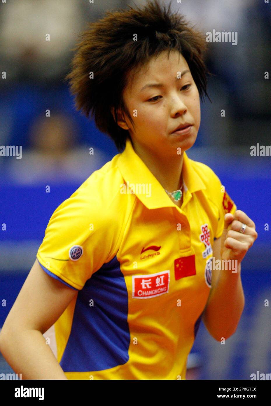 Zhang Yining of China reacts after defeating her compatriot Guo Yue in ...